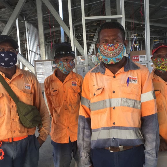 CPB Contractors - PNG site teaches mask-making skills to workers