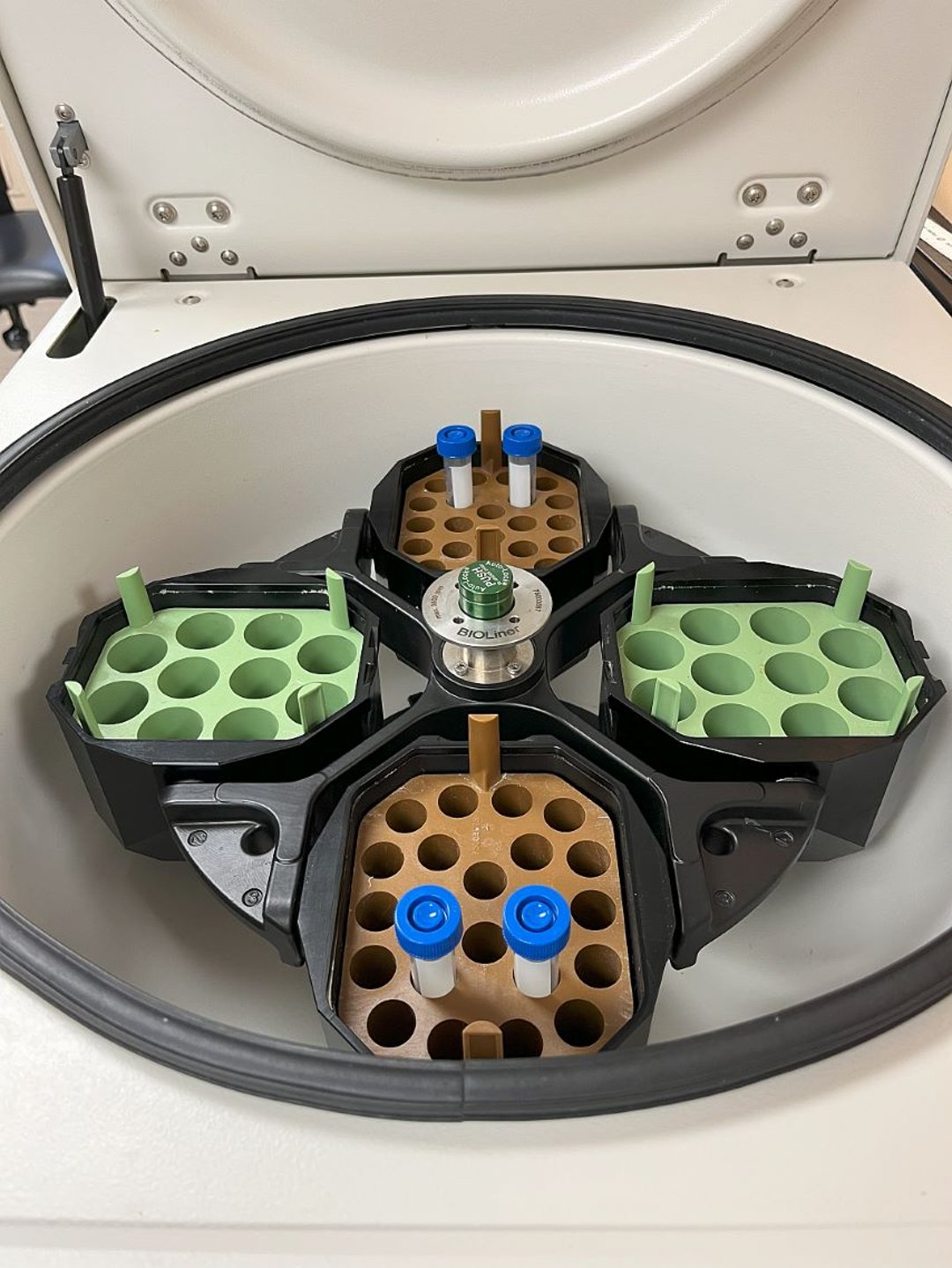 Image:Fecal flotation tubes in centrifuge-MSD Veterinary Manual